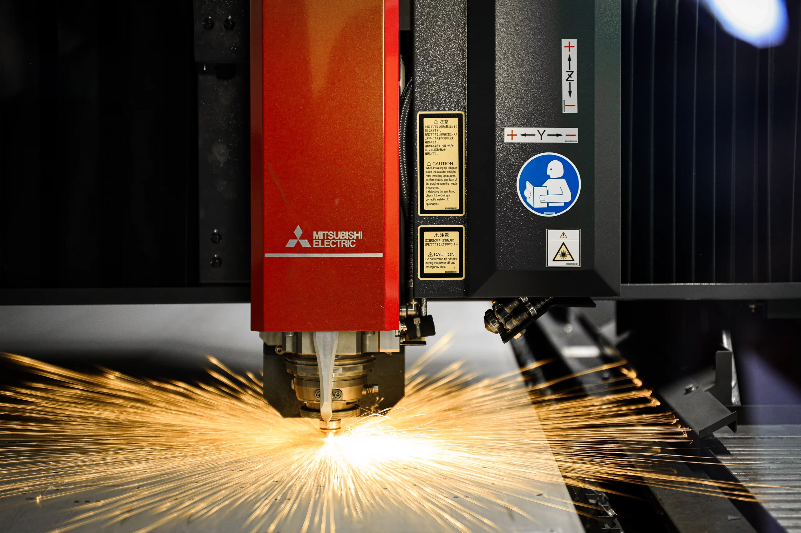 Mitsubishi Electric - laser cutting and automation systems.